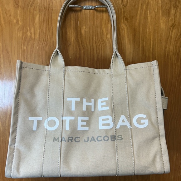 Marc Jacobs | Bags | Marc Jacobs Tan Canvas Tote Bag With Bold Text ...